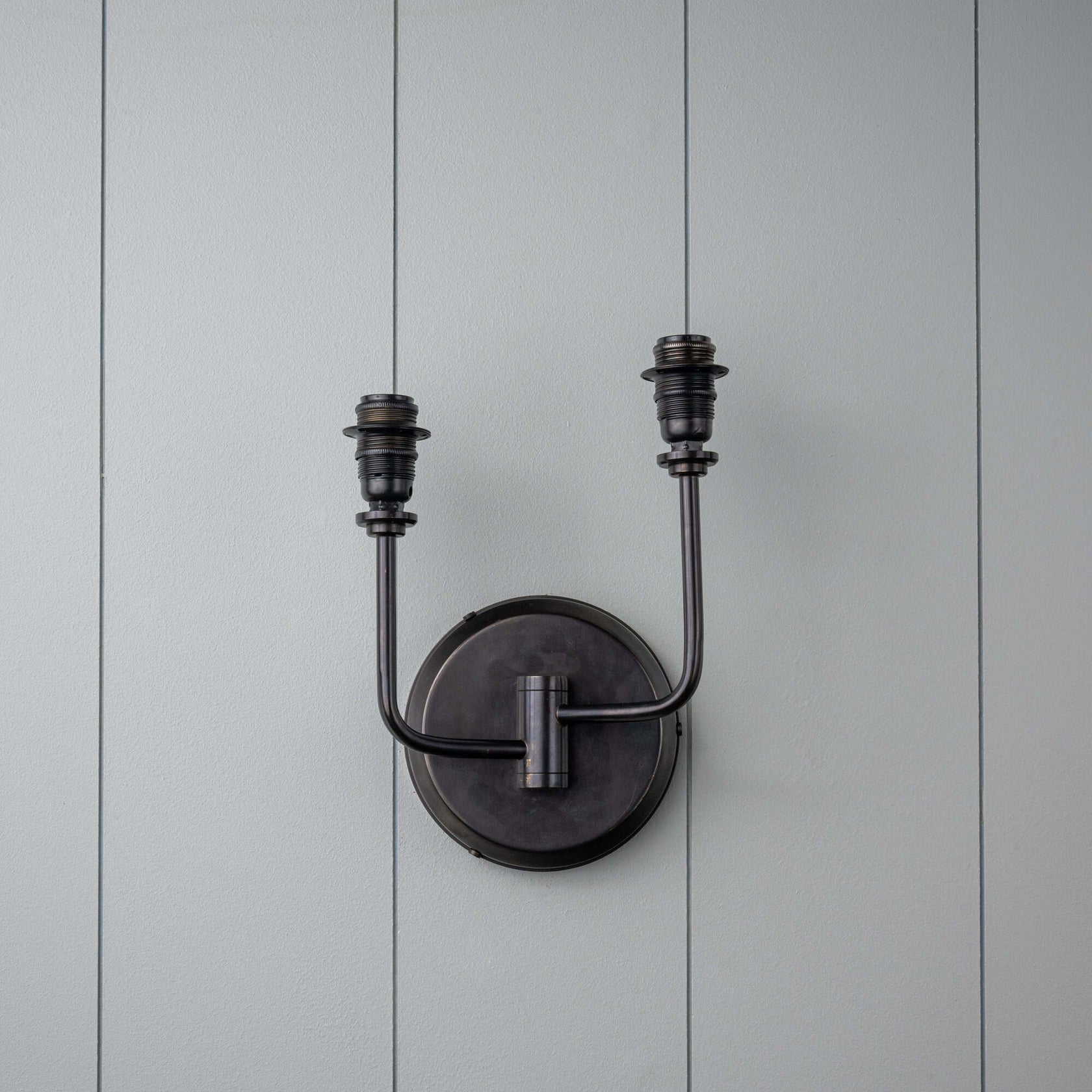 Brass double wall light with fancy mustard lampshade